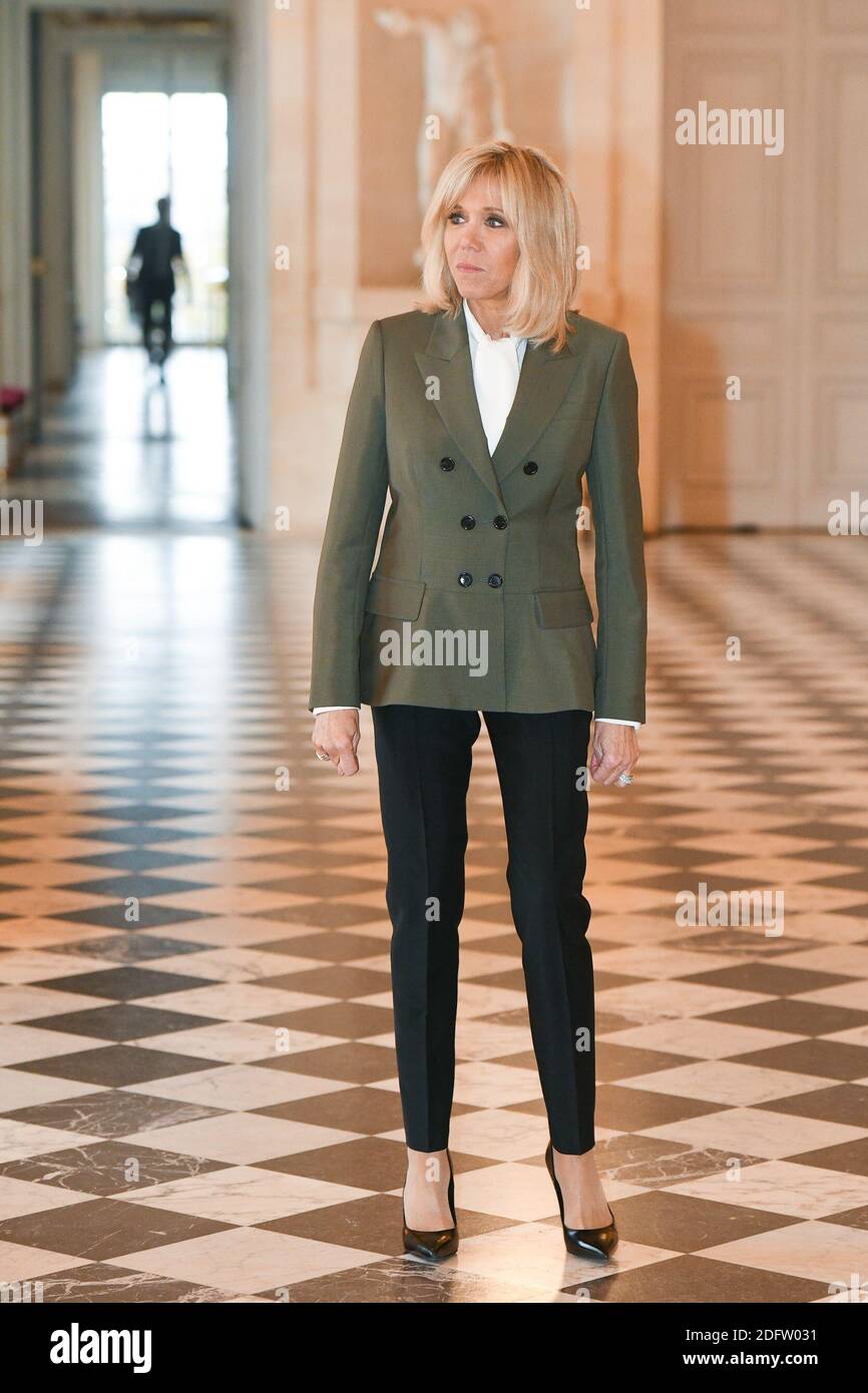 French President's wife Brigitte Macron welcomes spouses during an ...