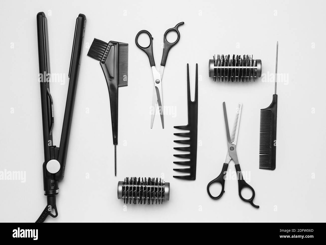 Set of hairdresser's tools on grey background Stock Photo - Alamy