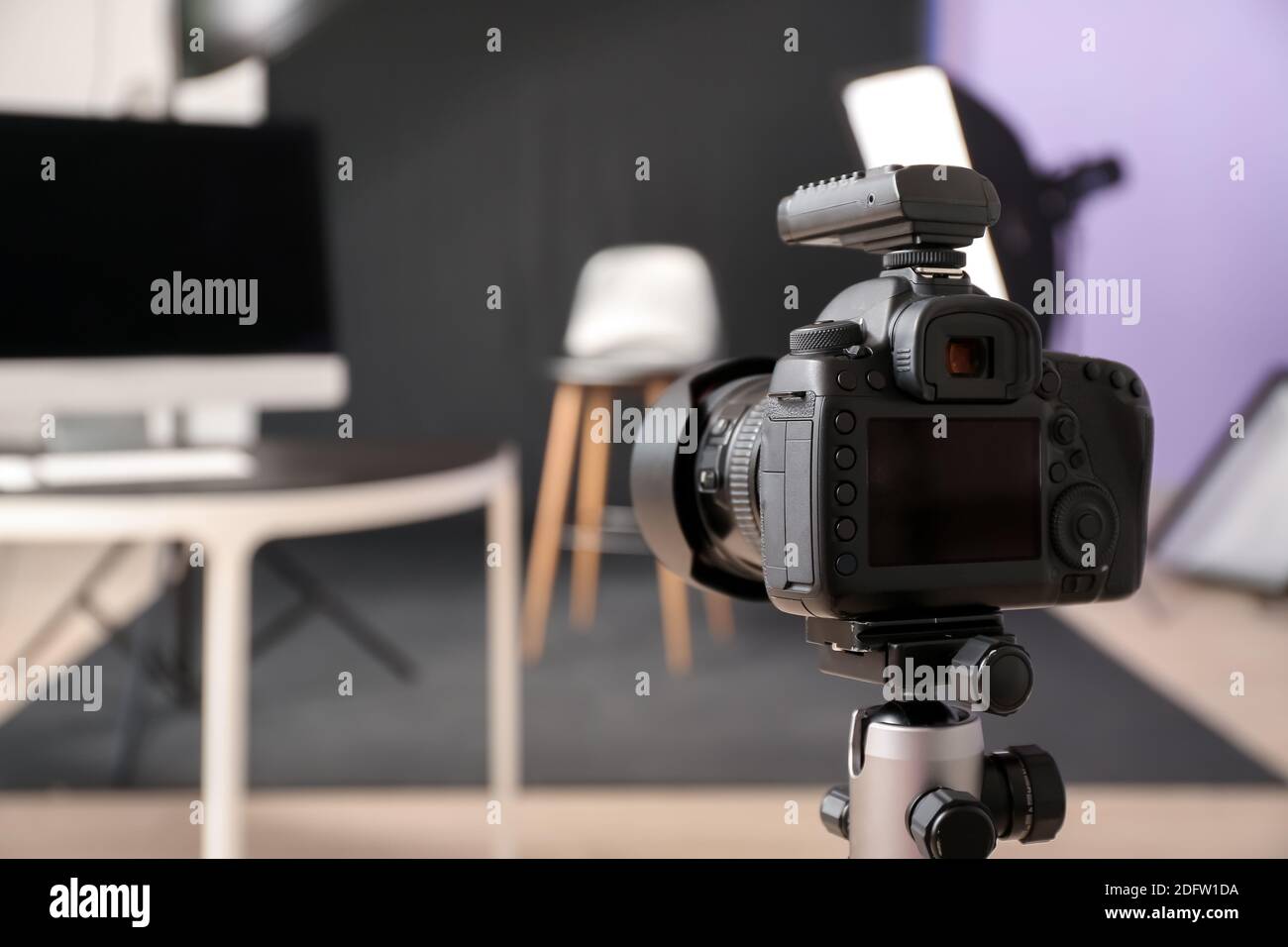 Modern camera and equipment in photo studio Stock Photo - Alamy
