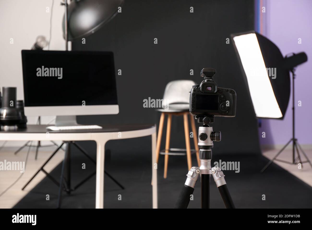 Modern camera and equipment in photo studio Stock Photo - Alamy