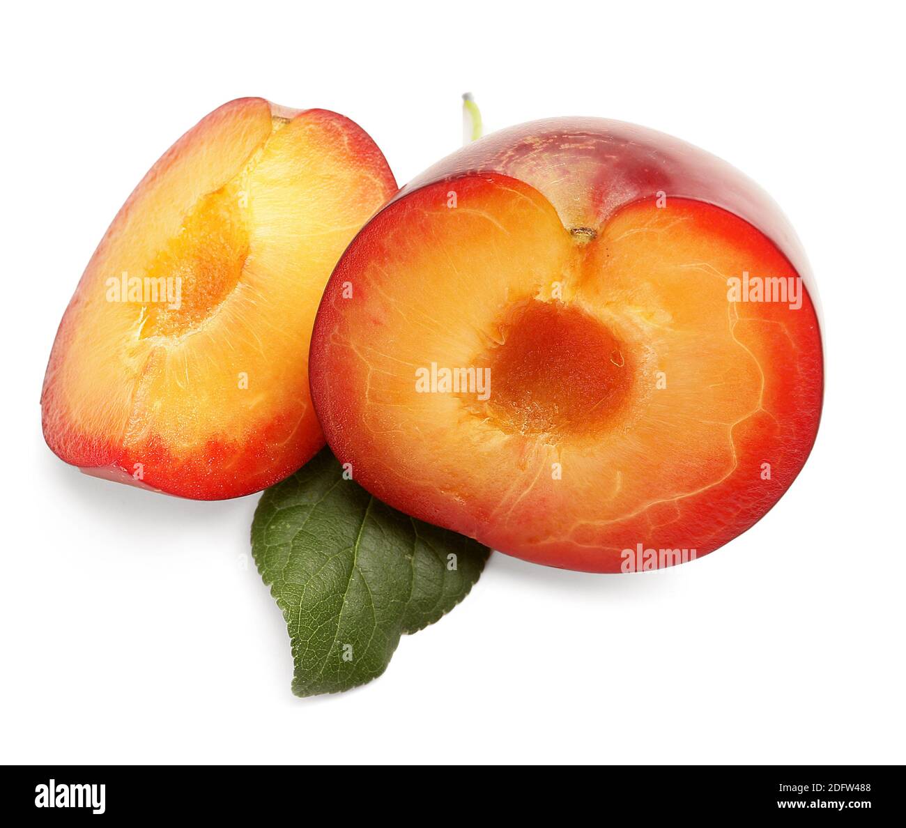 Cut plums isolated on white background Stock Photo - Alamy