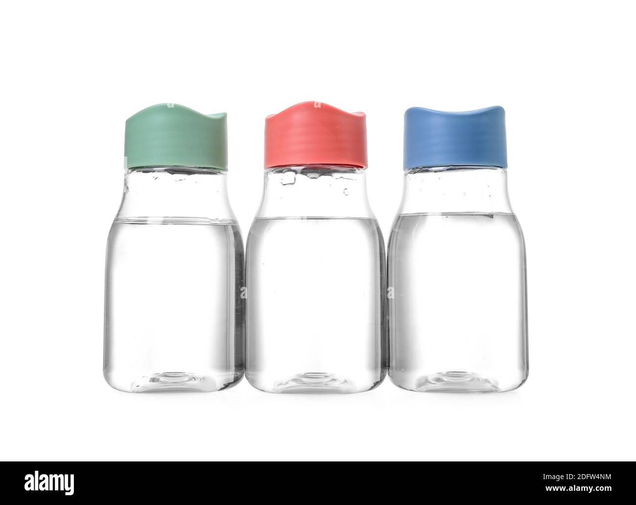 Bottles of clean water on white background Stock Photo - Alamy