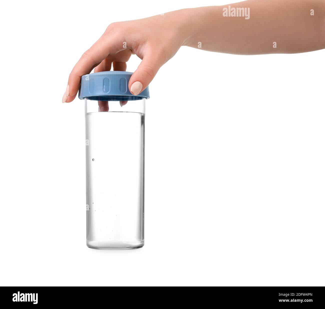 Hand with bottle of clean water on white background Stock Photo - Alamy