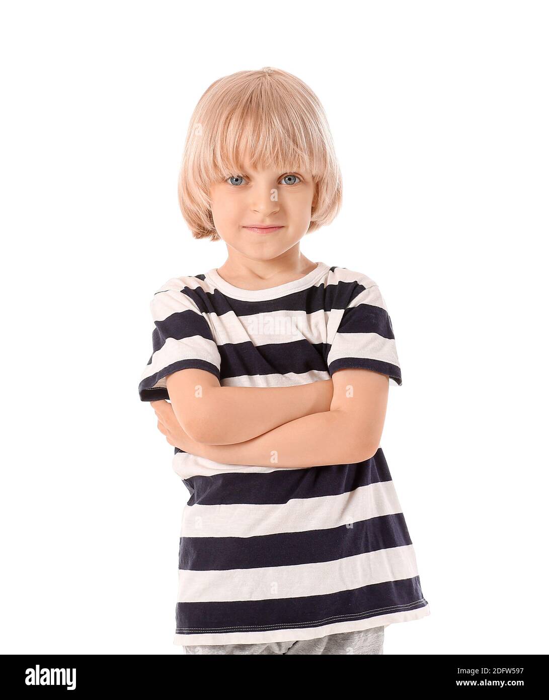 Cute little boy with crossed arms on white background Stock Photo - Alamy