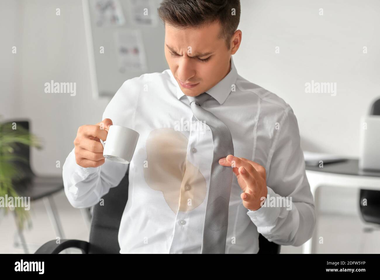 Man messy office clothes hi-res stock photography and images - Alamy