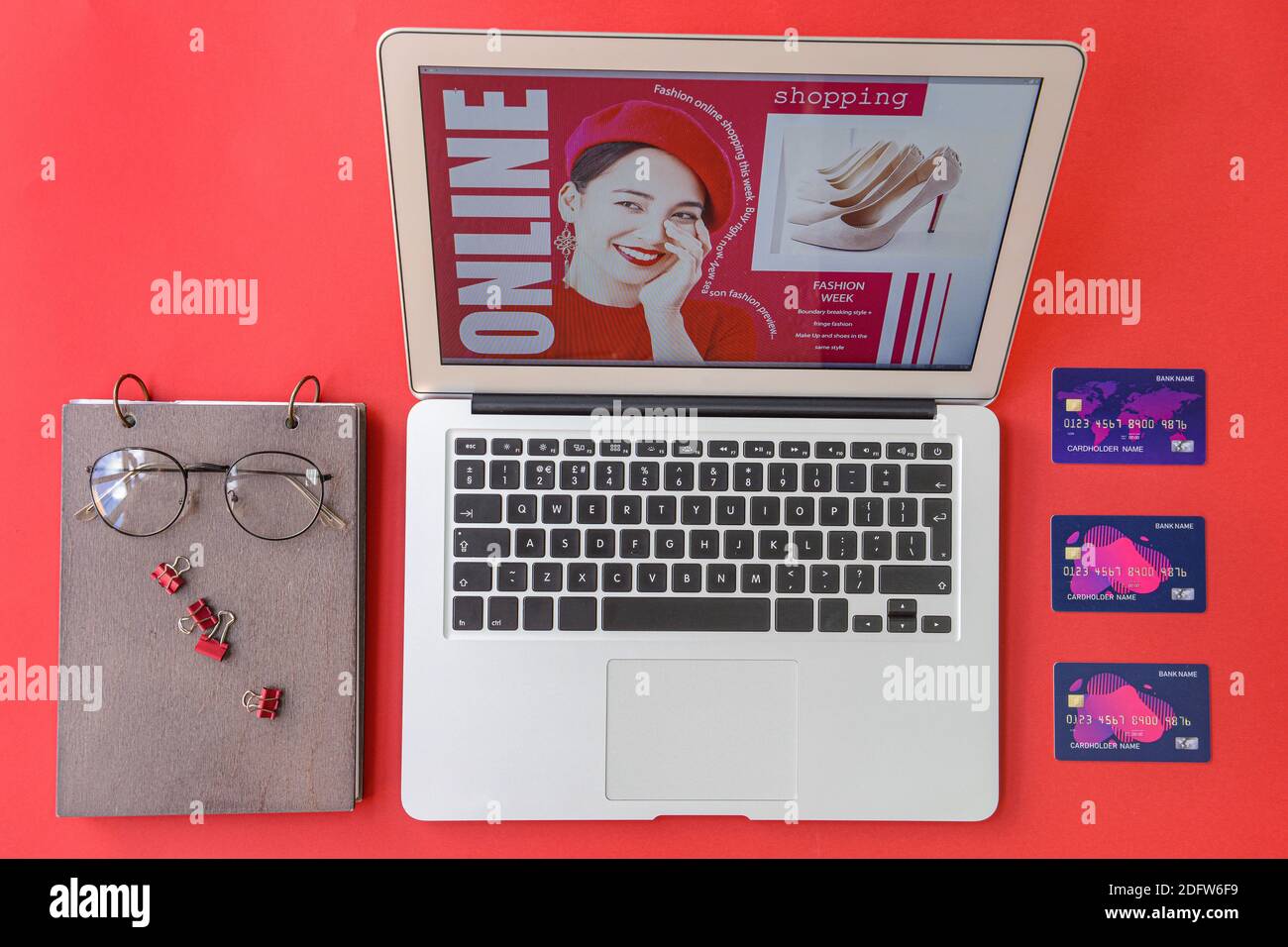 Composition with laptop computer on color background. Online shopping ...