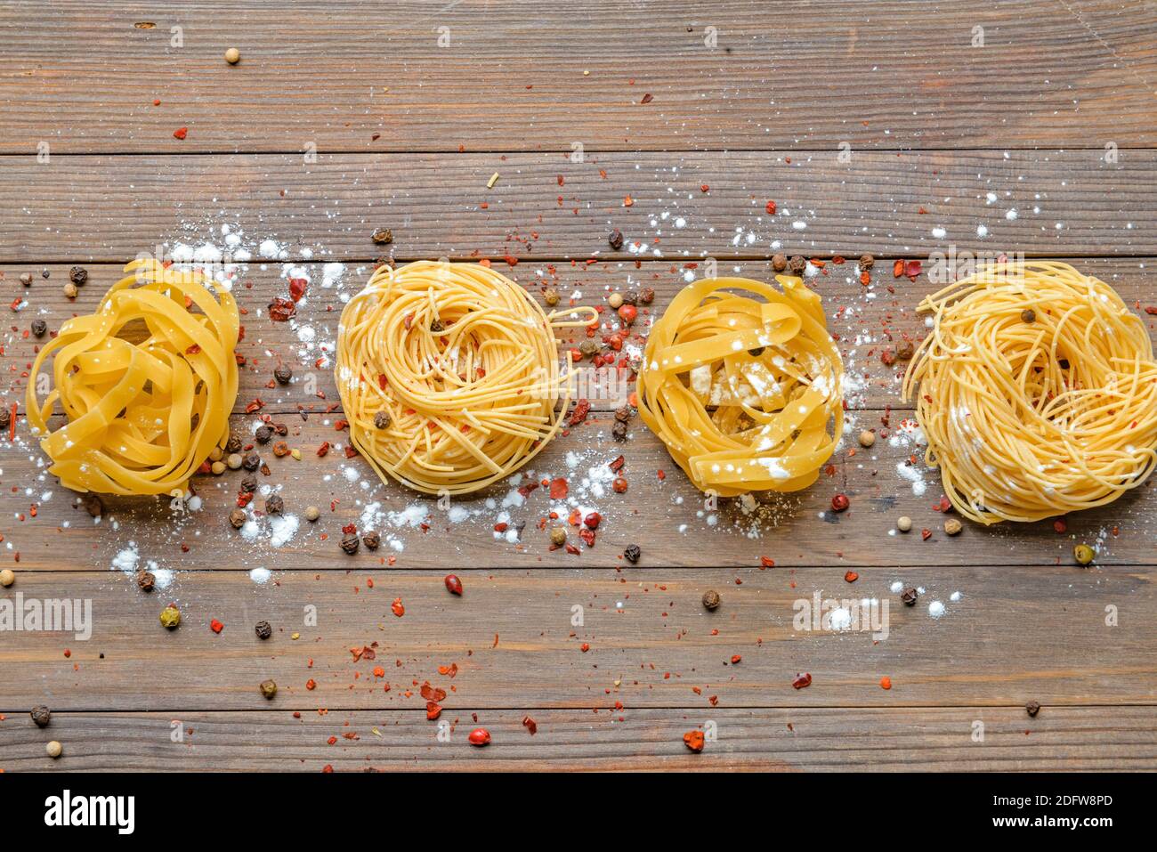 Uncooked different macaroni scattered dry hi-res stock photography and ...