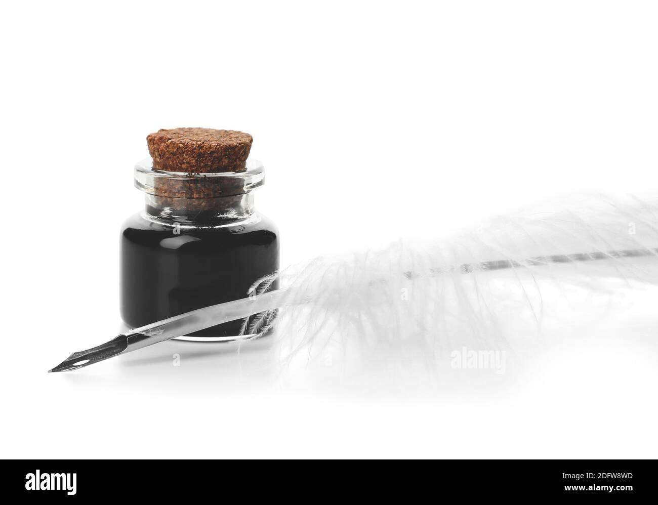 Feather pen and inkwell on white background Stock Photo - Alamy
