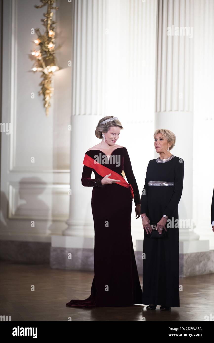 Belgium's Queen Mathilde and French President's wife Brigitte Macron ...