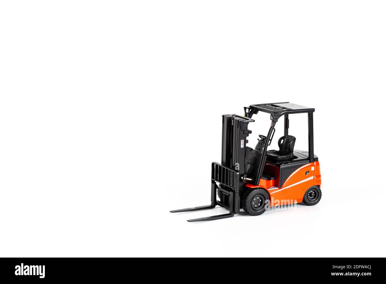 Red toy forklift loader isolated on white background. Copy Space for ...