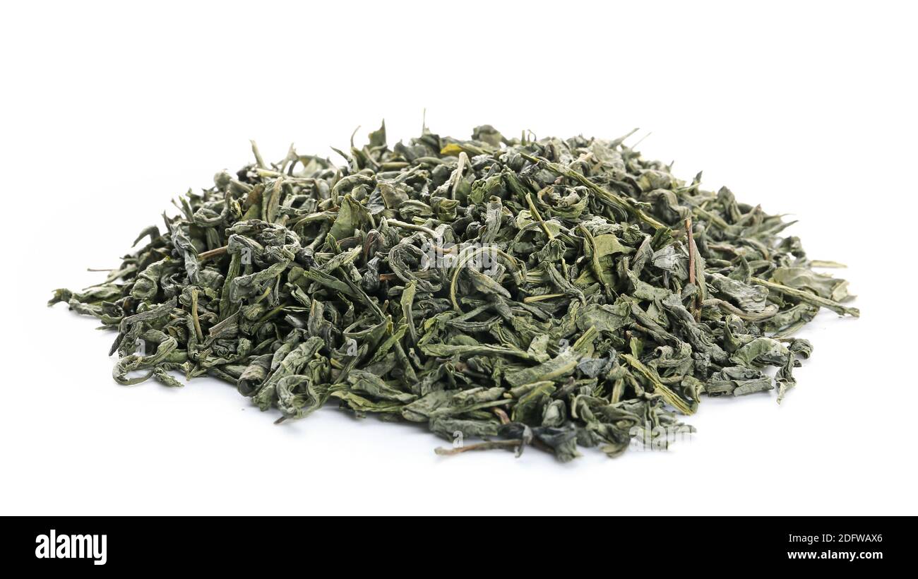 Dry green tea on white background Stock Photo - Alamy