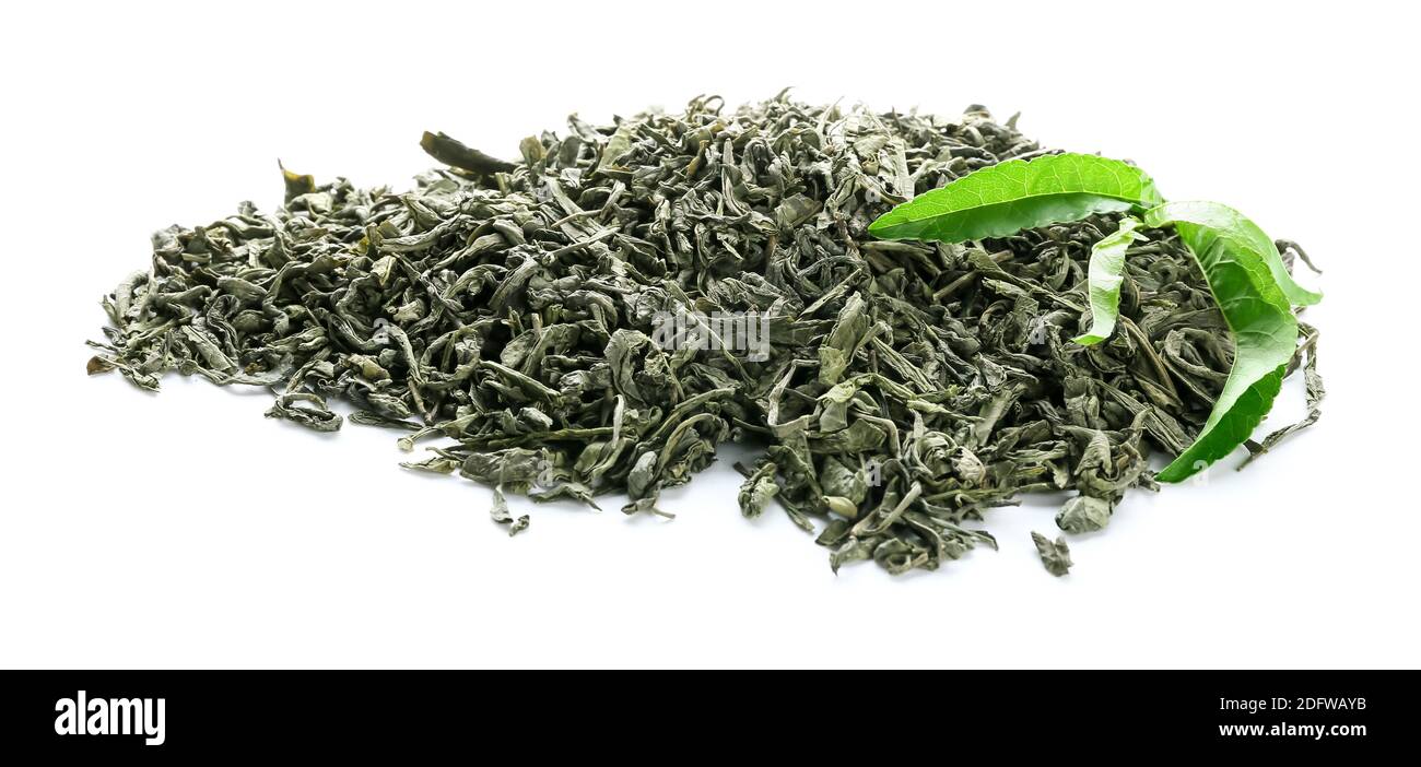 Dry green tea on white background Stock Photo - Alamy