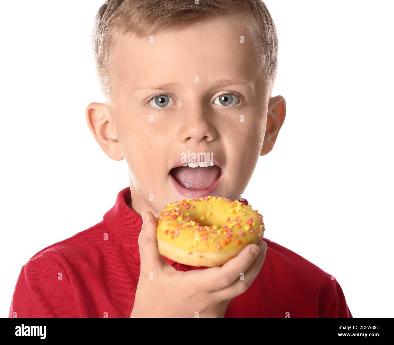Funny little boy with donuts on white background Stock Photo - Alamy