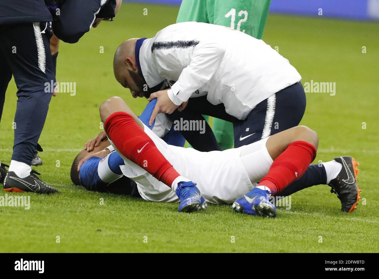 France's Kylian Mbappe is badly wounded in his right shoulder during ...