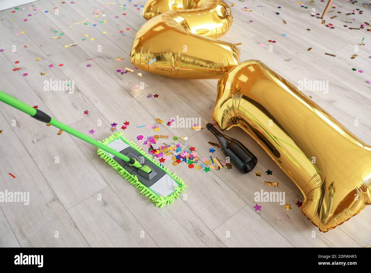 Cleaning of messy room after party celebration Stock Photo - Alamy