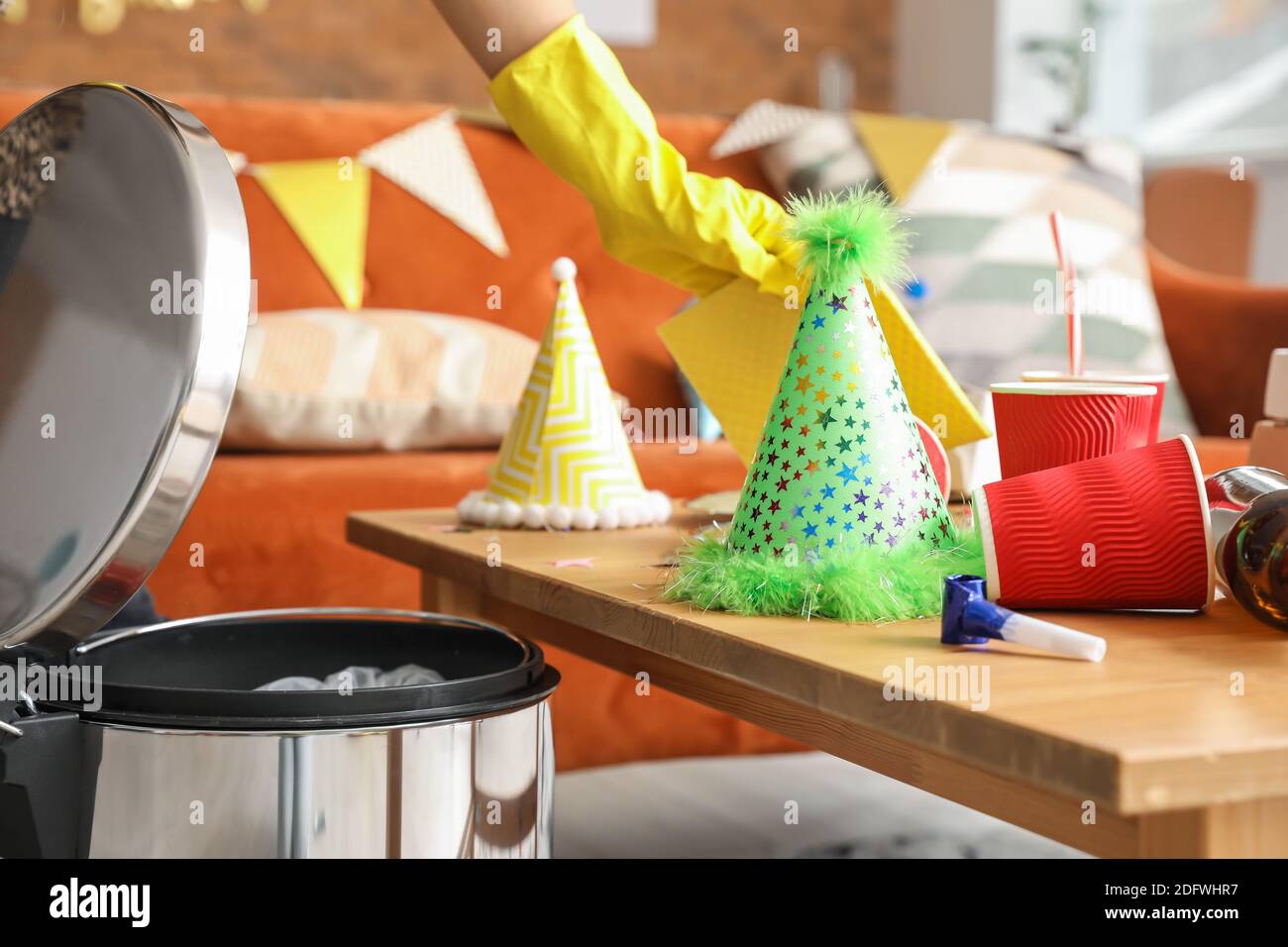Cleaning of messy room after party celebration Stock Photo - Alamy