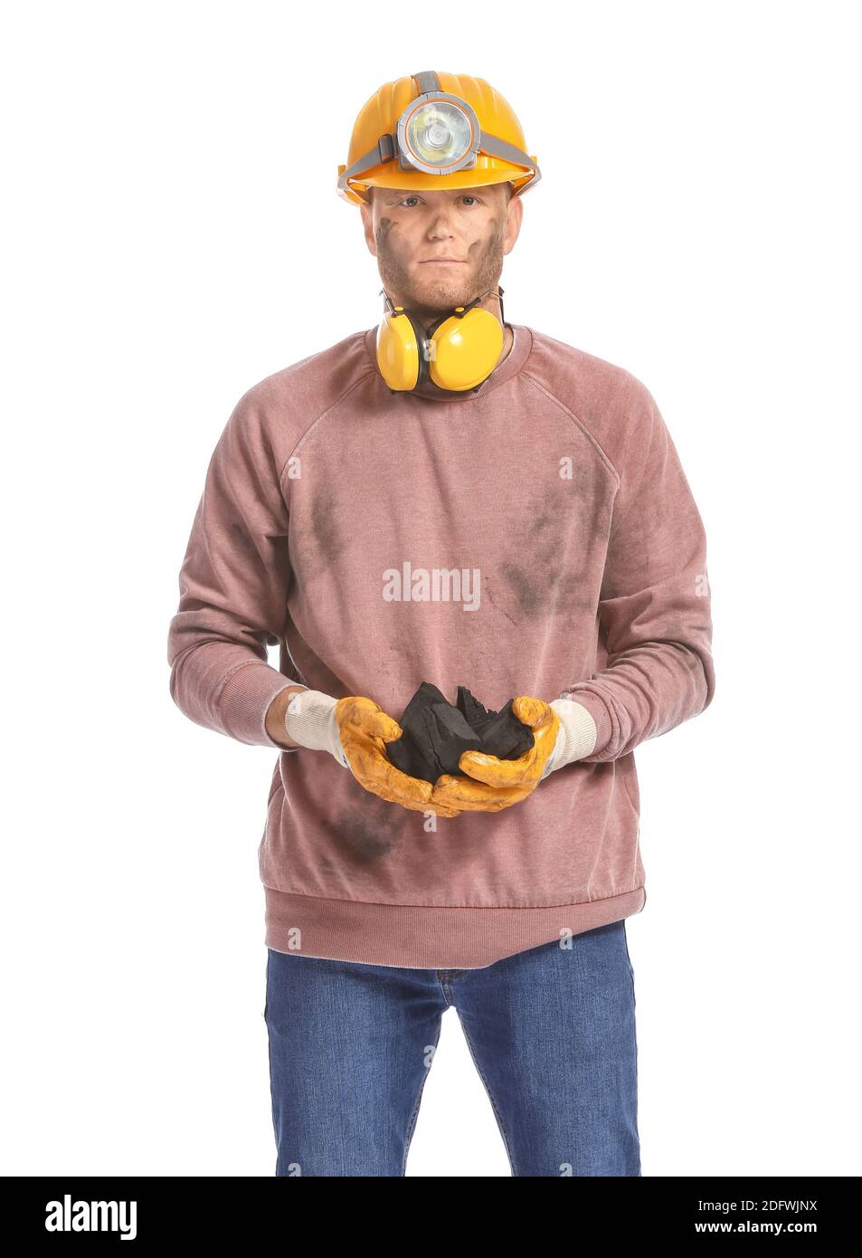 Miner man with coal on white background Stock Photo - Alamy