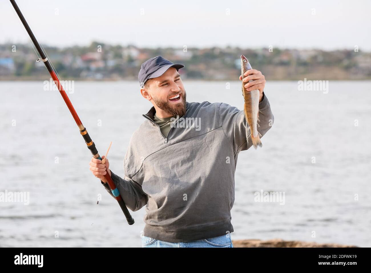 Bearded man fishing on river hi-res stock photography and images - Alamy