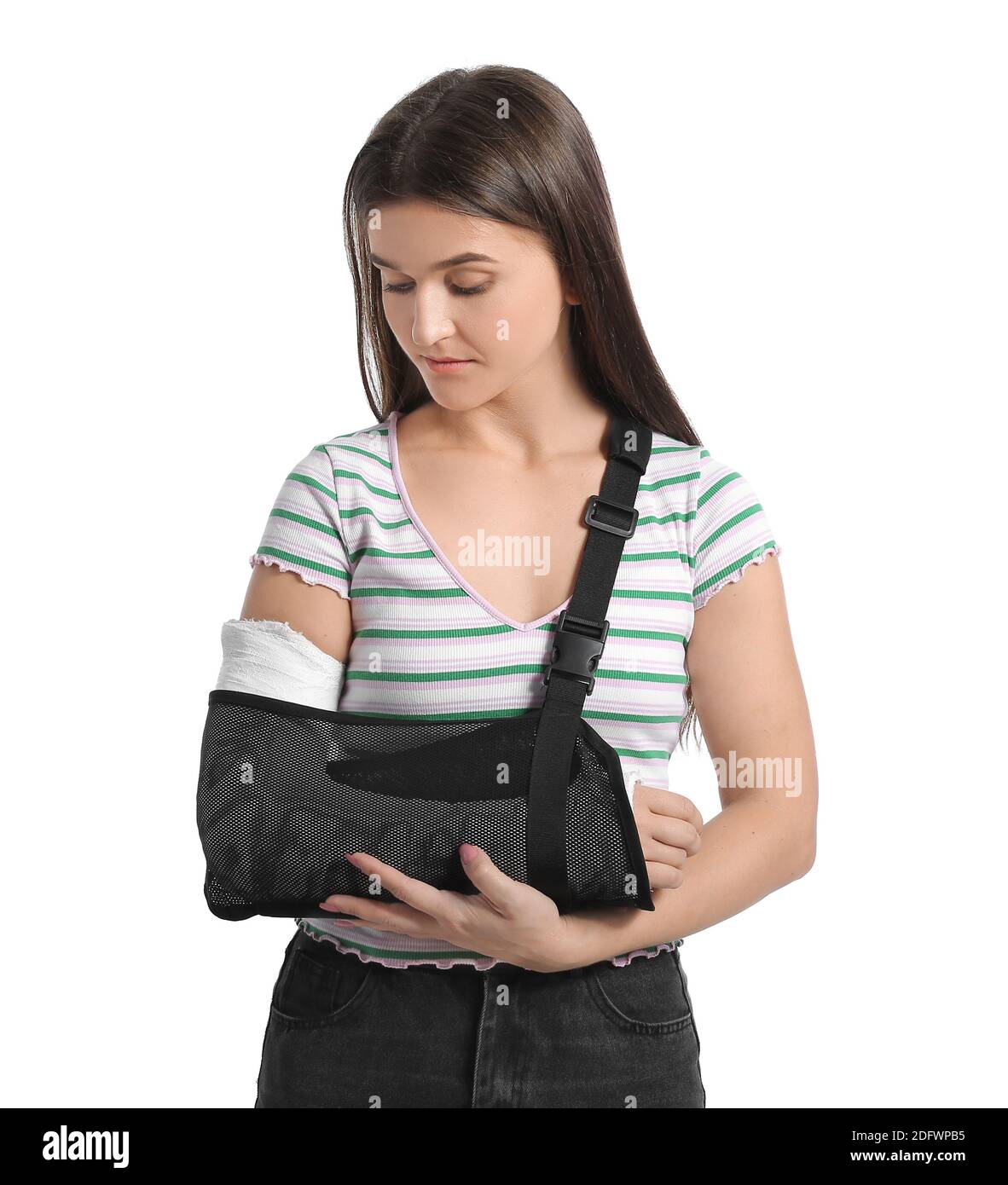 Young woman with broken arm on white background Stock Photo - Alamy