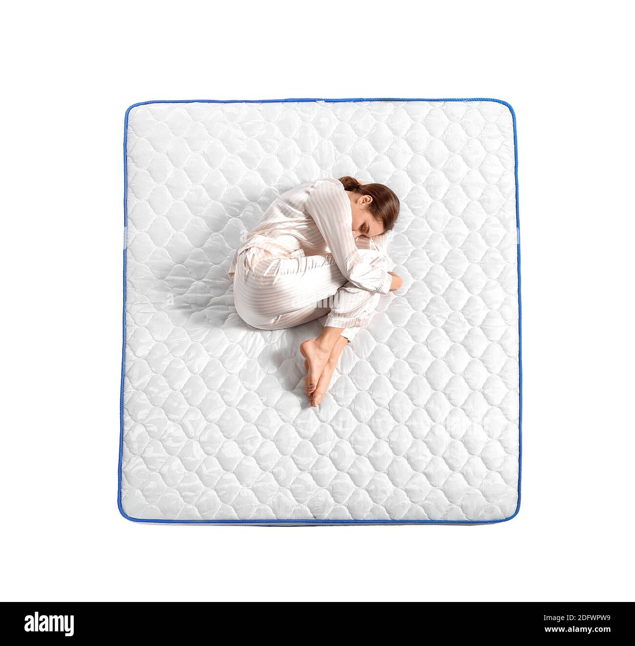 Sad young woman bed Cut Out Stock Images & Pictures - Alamy