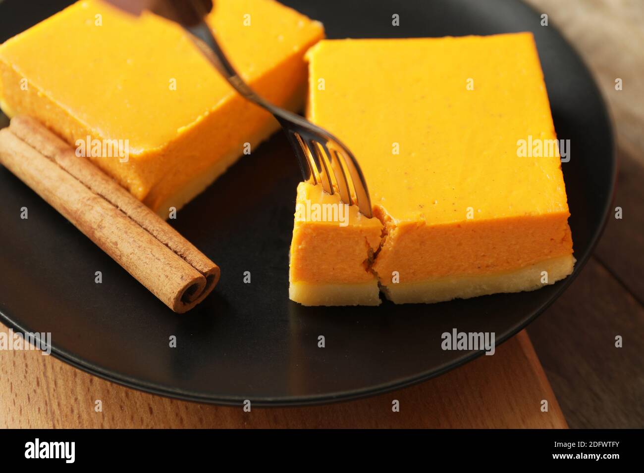 Eating of tasty pumpkin pie from plate, closeup Stock Photo - Alamy