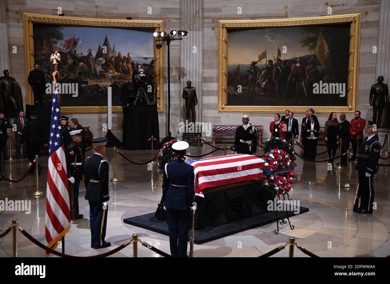 The flag-draped casket of former U.S. President George H.W. Bush lies ...