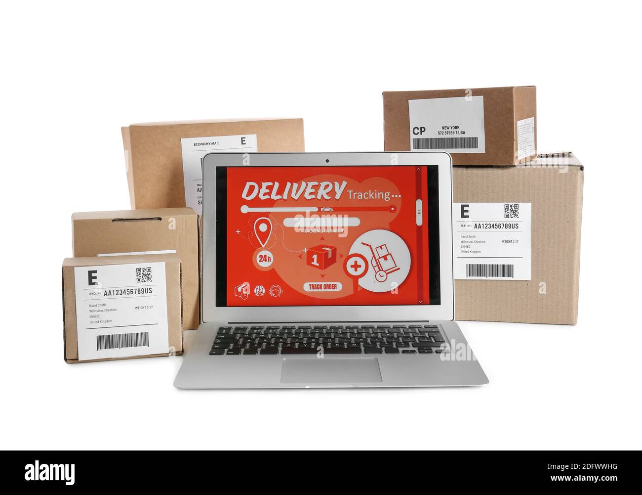 Laptop with open page of delivery service application and parcels on ...