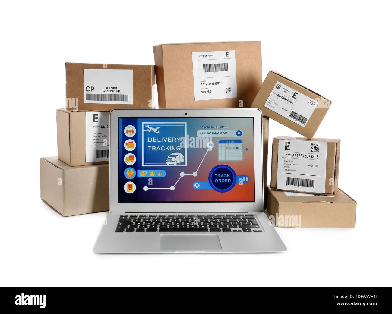Laptop with open page of delivery service application and parcels on ...