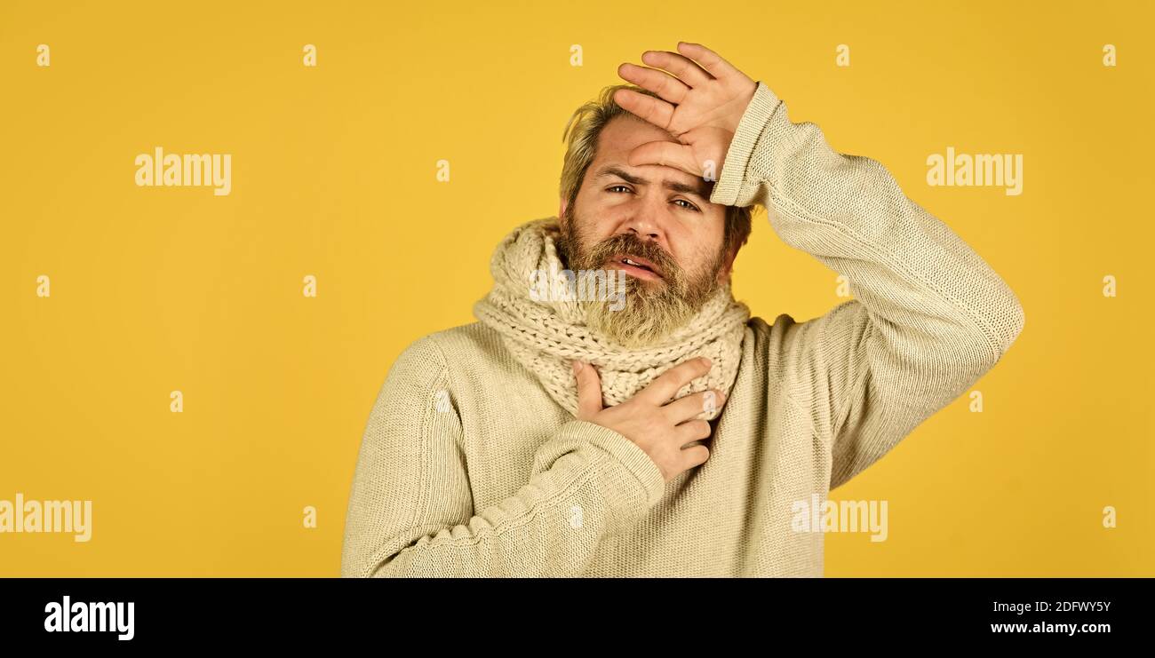 Immune response. Bearded man sick. Warm scarf around neck. Cold flu ...