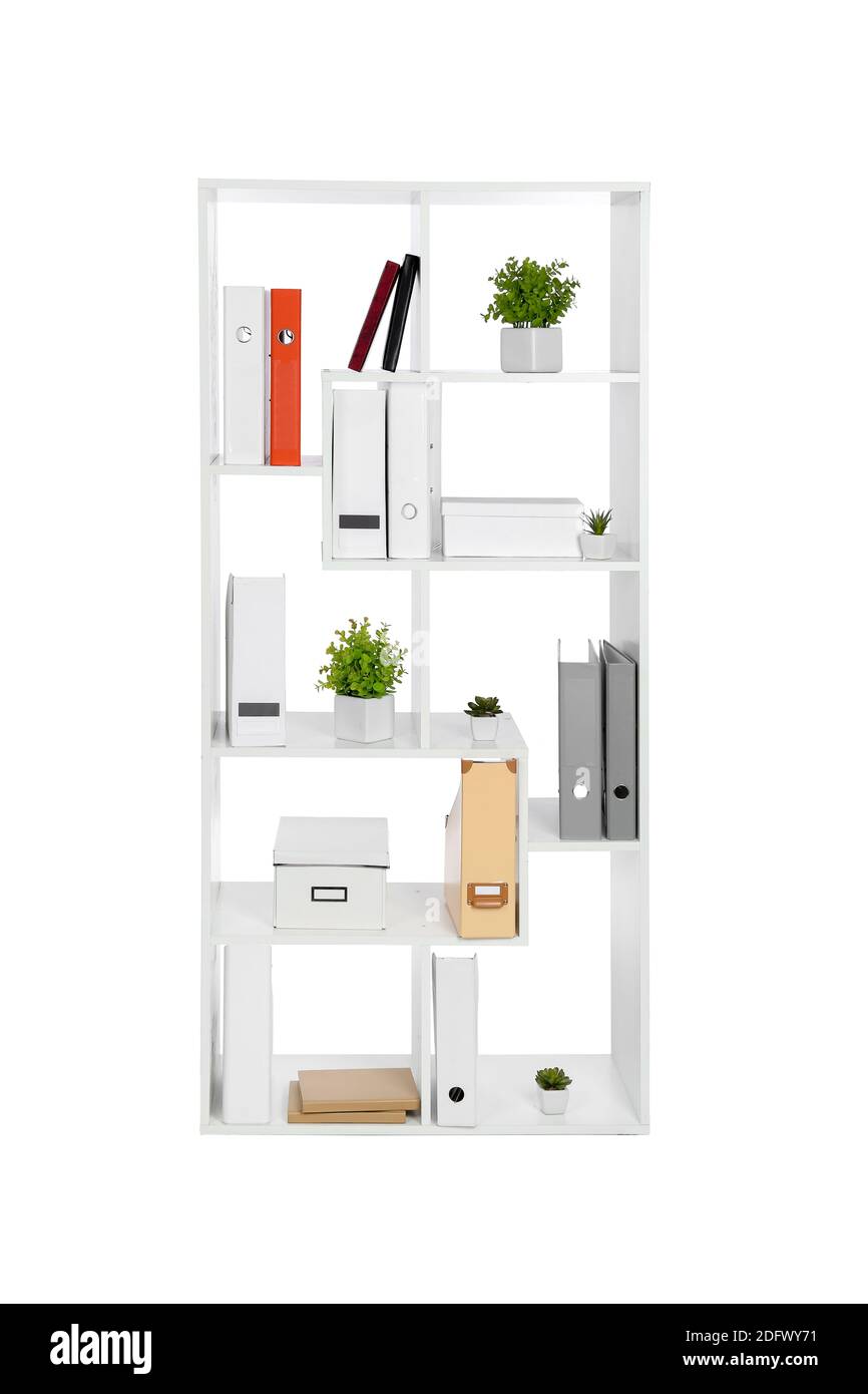 Modern shelf unit on white background Stock Photo - Alamy
