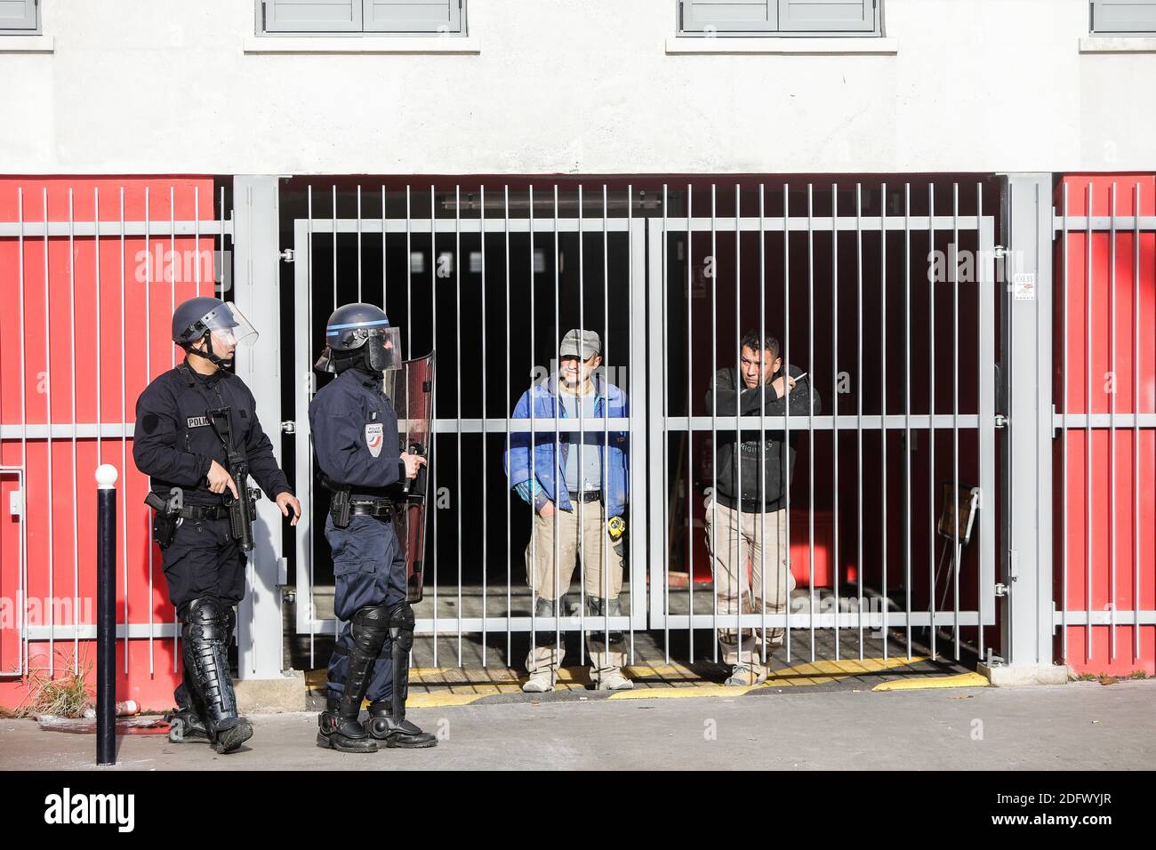 French riot police officers take position during a demonstration of ...