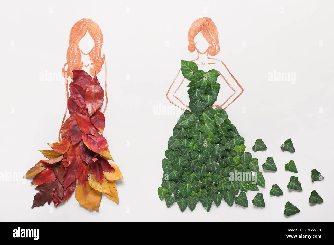 Drawn women in dresses made of autumn leaves on white background Stock ...