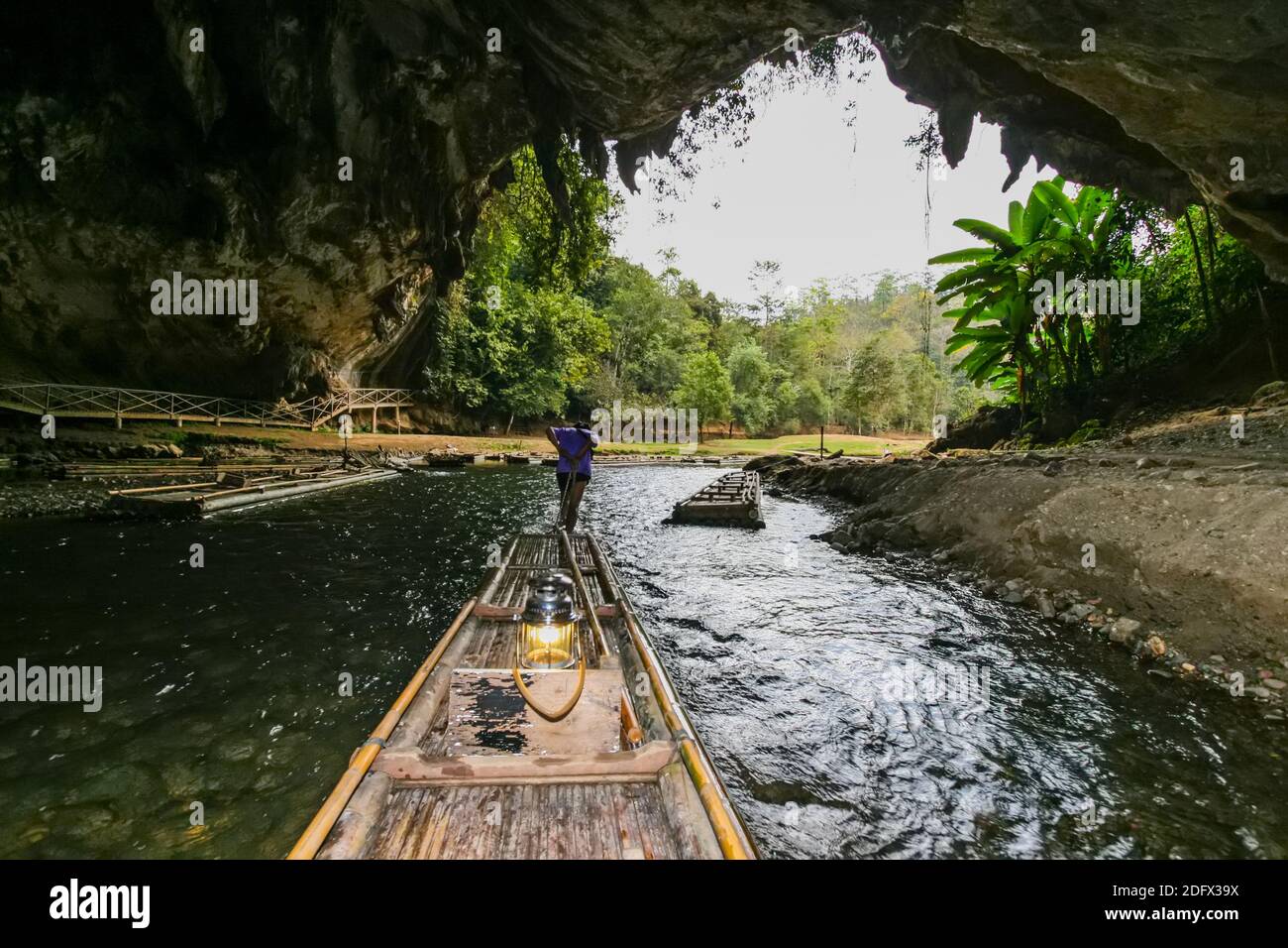 Man drag boat at Cave lod phenomenon stone stalactite and stalagmite of ...