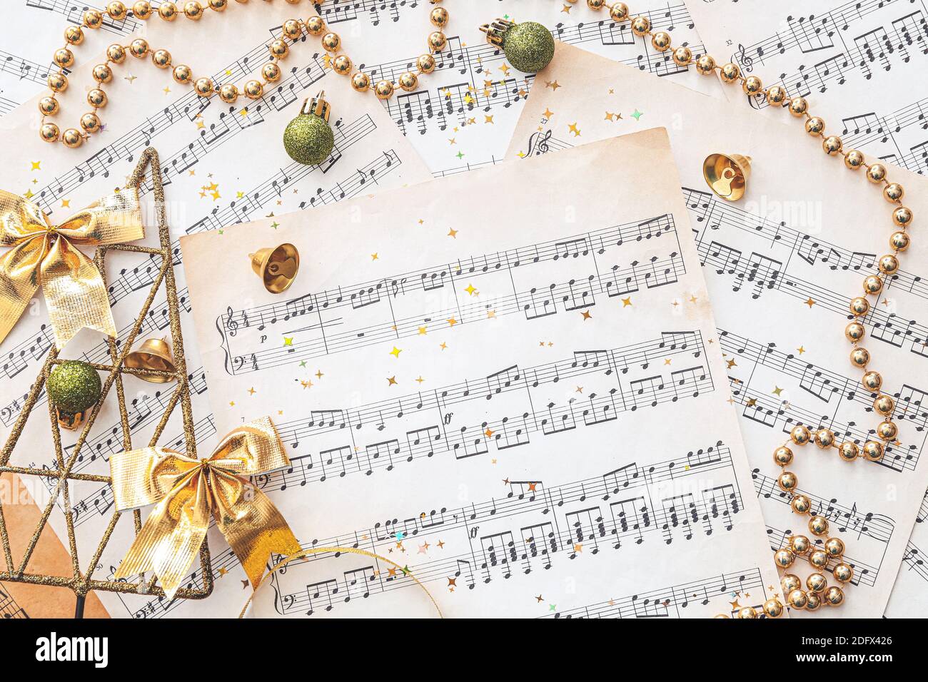 Christmas decor on note sheets Stock Photo - Alamy