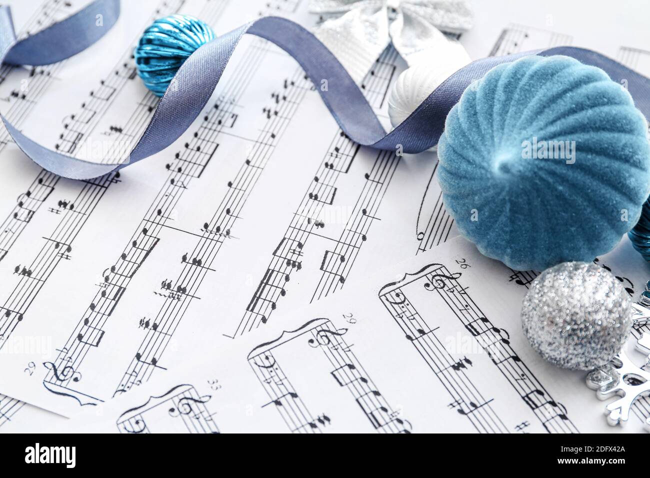 Christmas decor on note sheets Stock Photo - Alamy