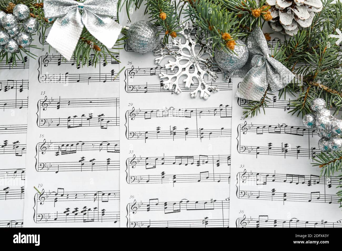 Christmas decor on note sheets Stock Photo - Alamy