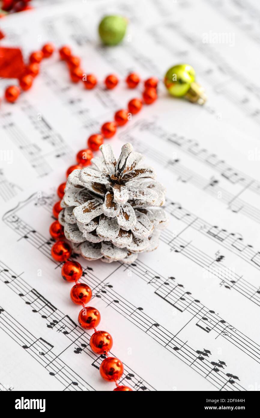Christmas decor on note sheets Stock Photo - Alamy