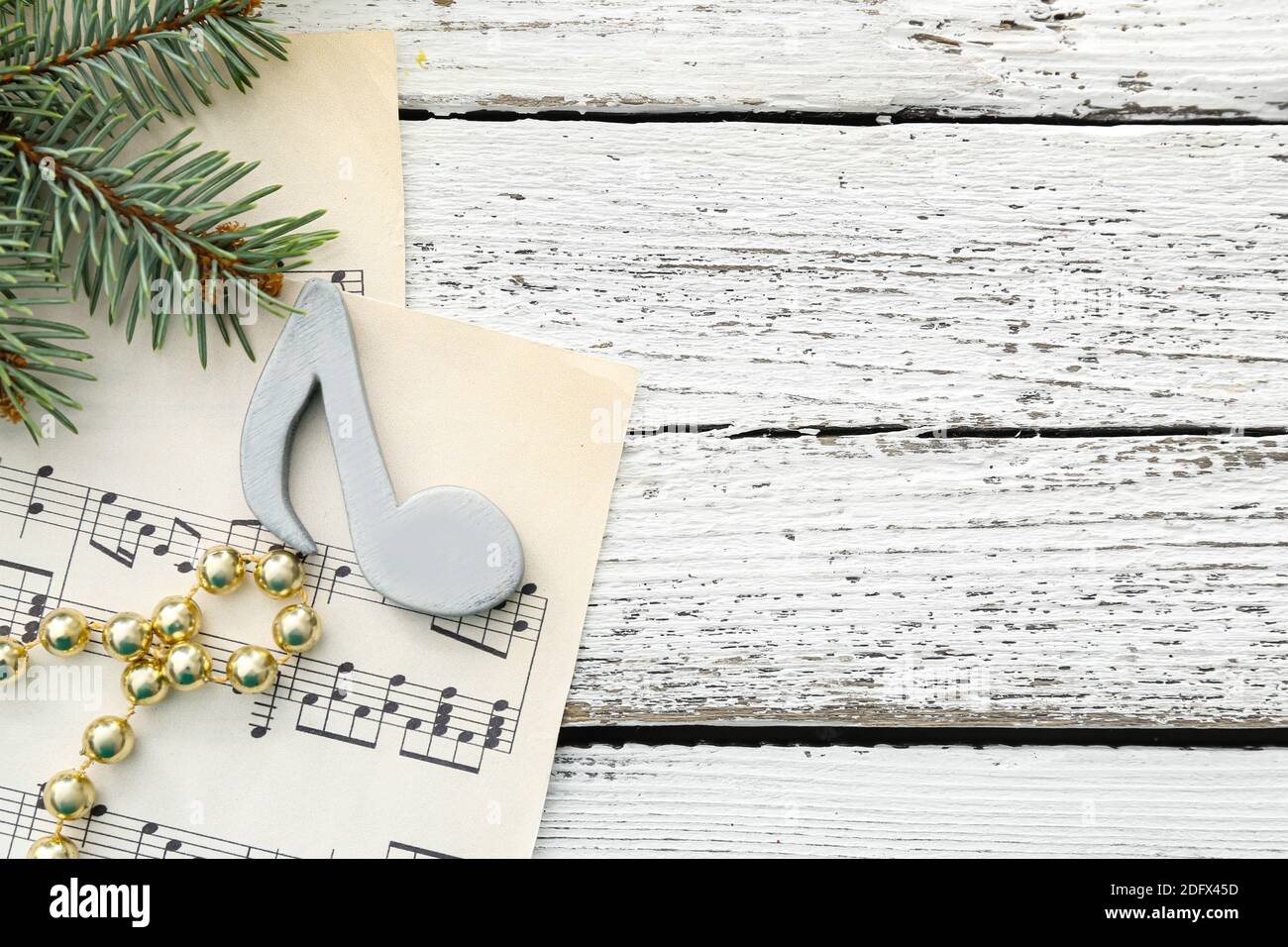 Note sheets and Christmas decor on wooden background Stock Photo - Alamy