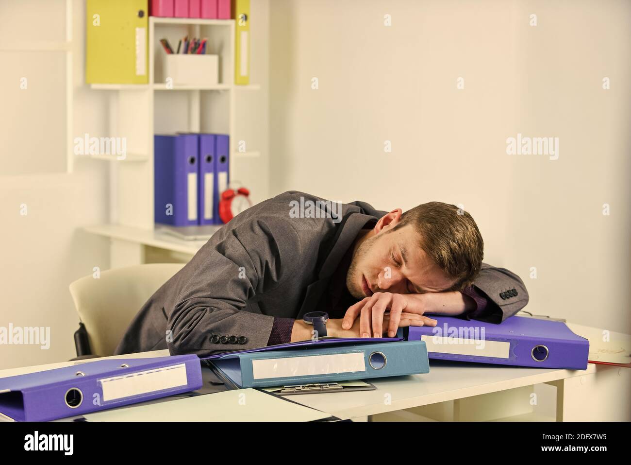 Worker sleep on documents folders workplace, workaholic man concept ...