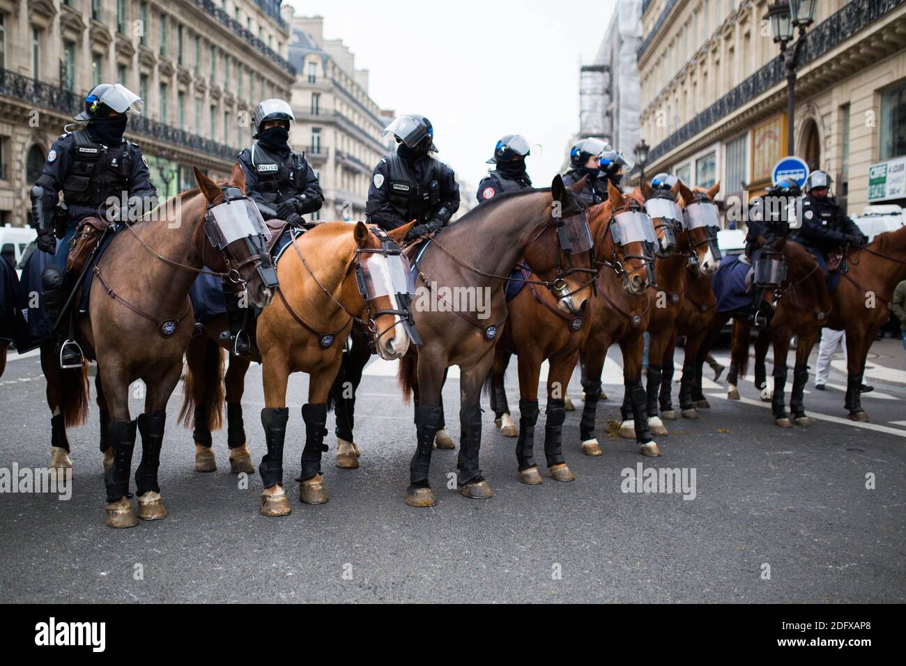 French Police officers patrol on thier horses at the place de l'Opera ...