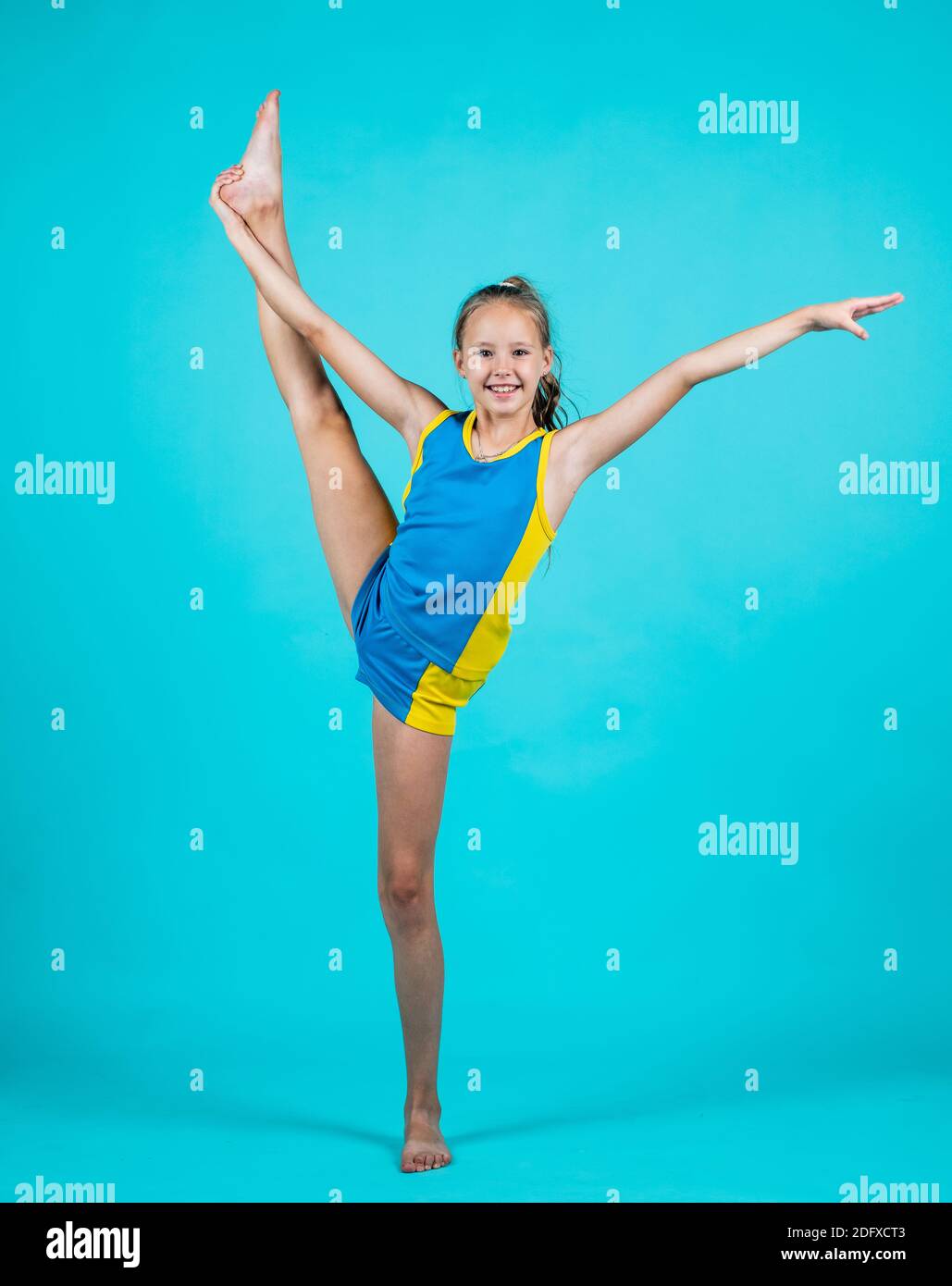 teen girl wear sportswear for training gymnast in split, sport Stock ...