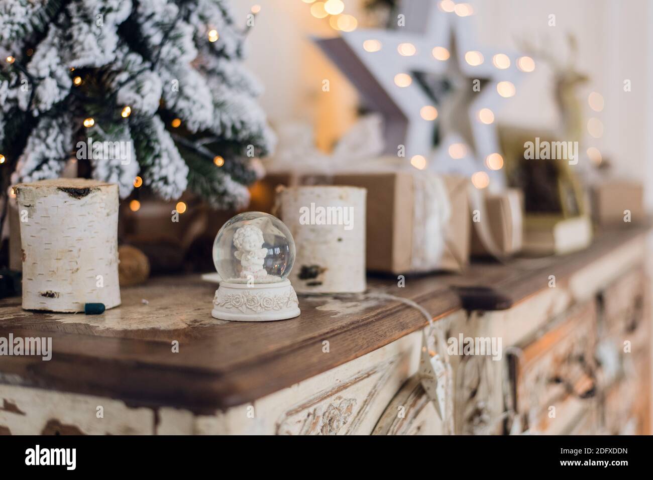 Snow globe little angel inside hi-res stock photography and images - Alamy