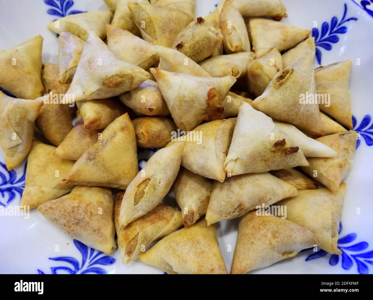 "Samosa", an Indian puff made with flour and spicy potatoes Stock Photo ...
