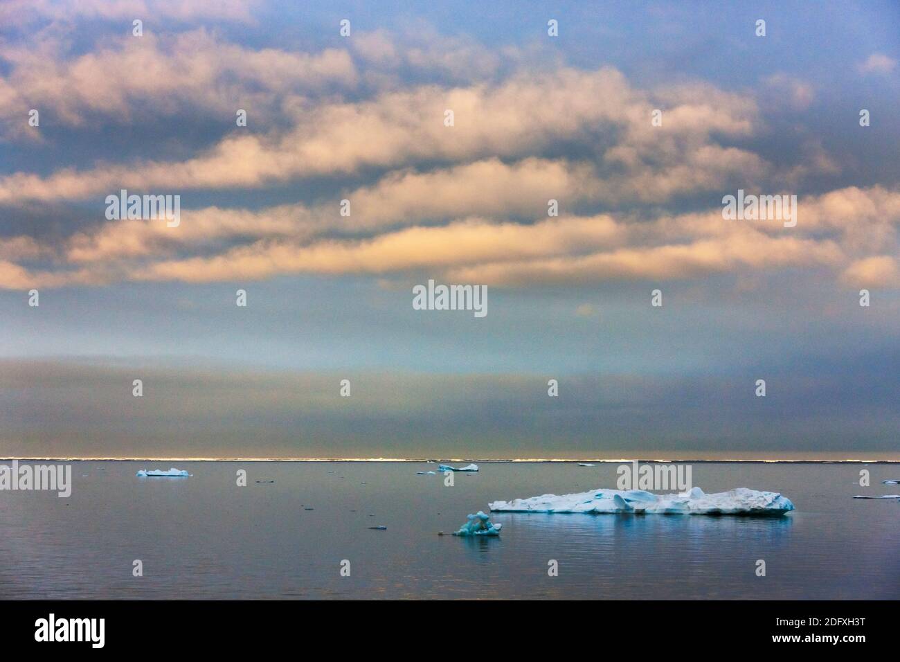 Sunset view of floating ice on Bering Sea, Russia Far East Stock Photo ...