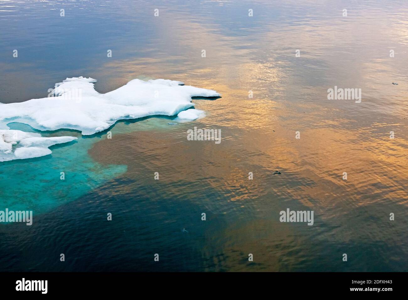 Sunset view of floating ice on Bering Sea, Russia Far East Stock Photo ...