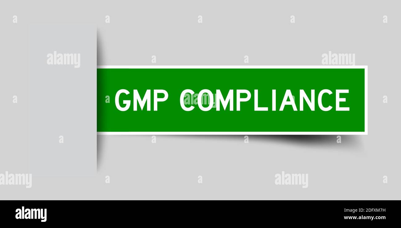 Inserted green color sticker label with word GMP (Abbreviation good ...