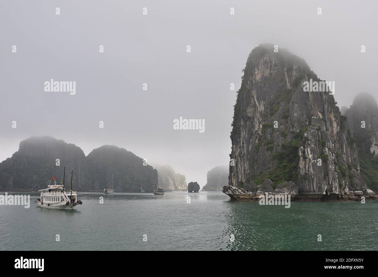 Rock formation and cave in Vietnam Stock Photo - Alamy
