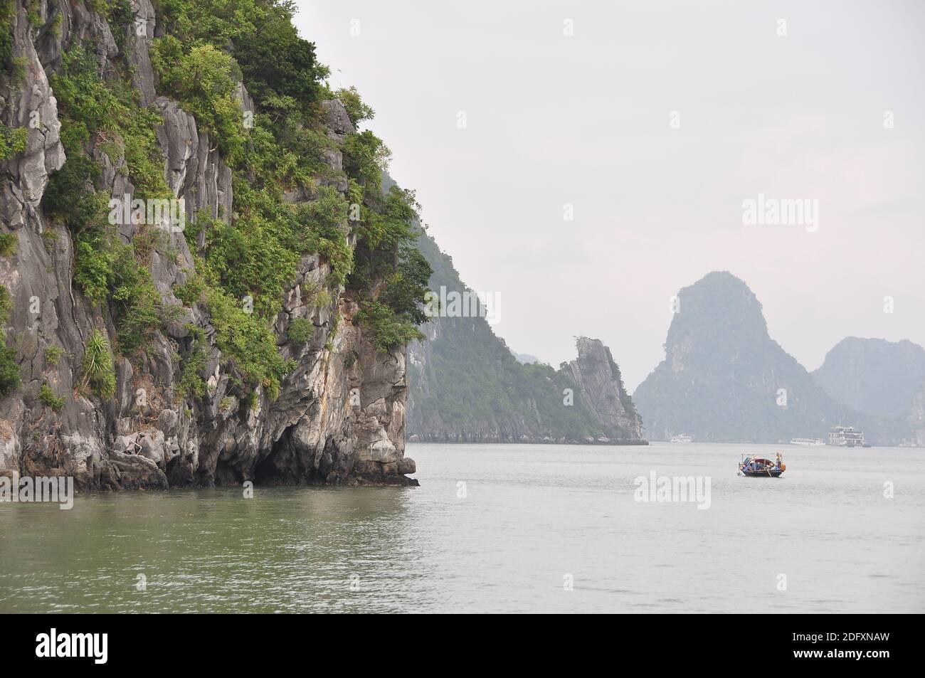 Rock formation and cave in Vietnam Stock Photo - Alamy