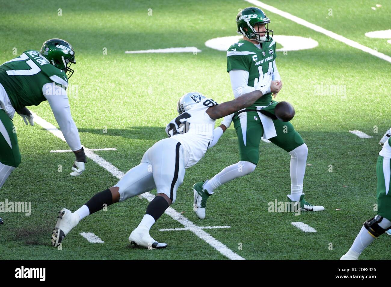 Las Vegas Raiders defensive end Clelin Ferrell (96) forces a fumble by New York Jets quarterback ...