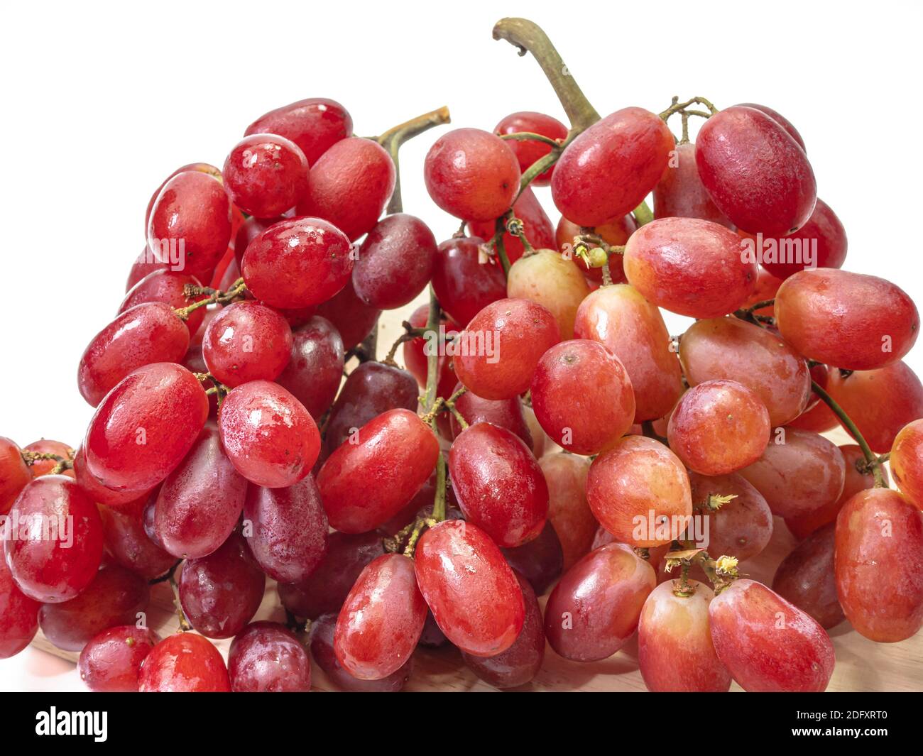 The close up of fresh red grapes organic fruit food isolated on white ...